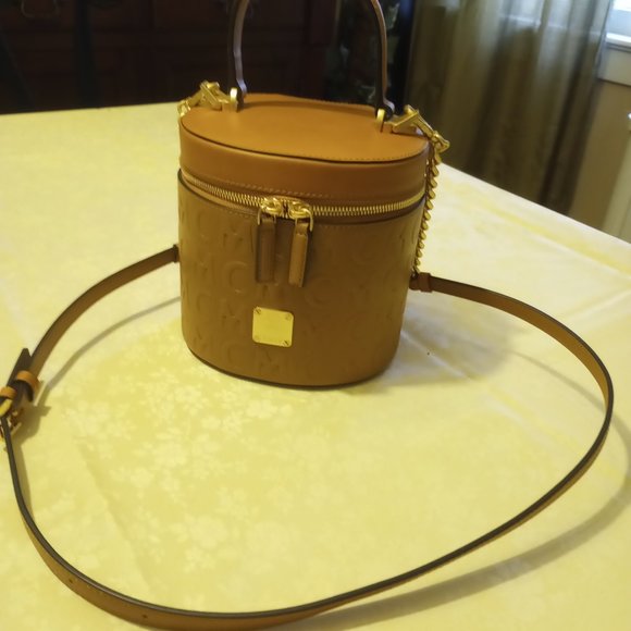 MCM | Bags | Mcm Calfskin Embossed Monogram Cylinder Bucket | Poshmark